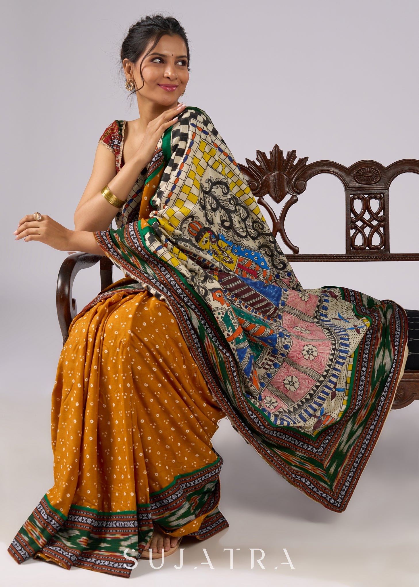 Vibrant yellow Bandhni print rayon saree with hand painted Madhubani a ...