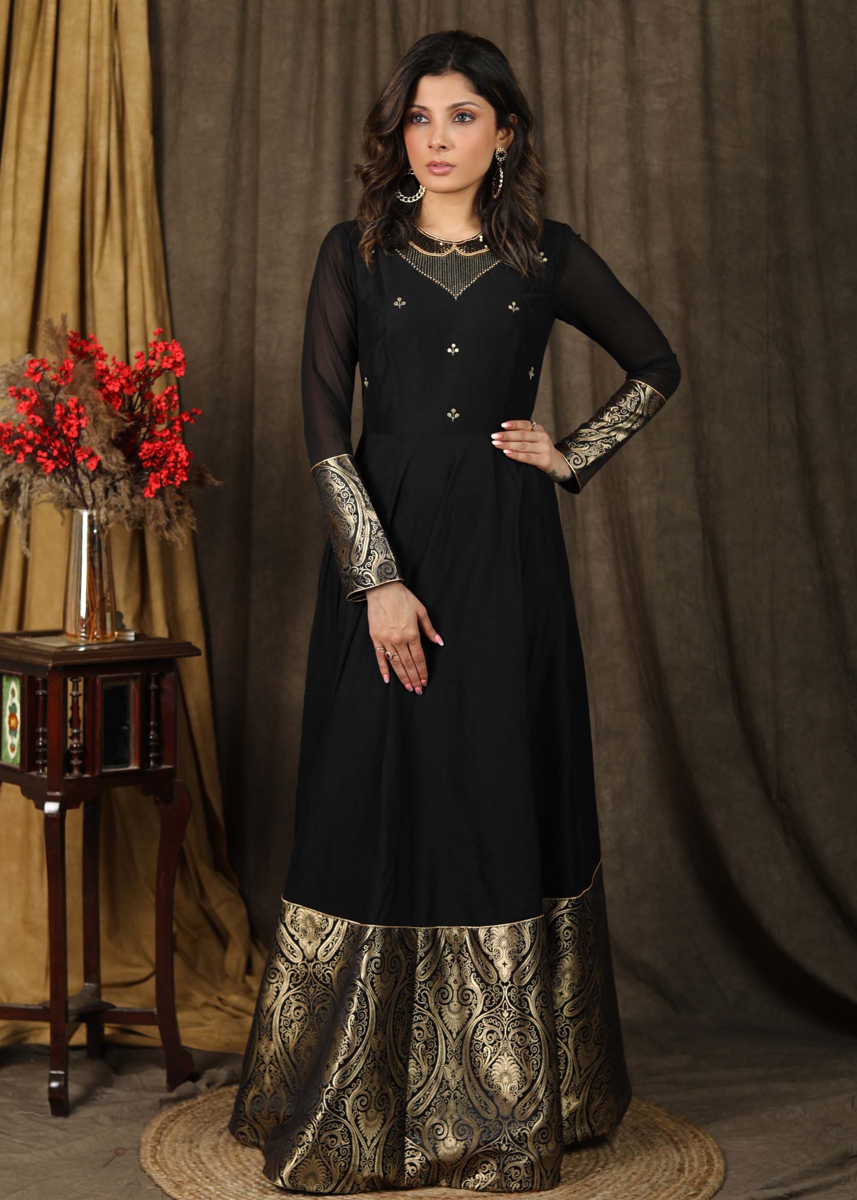 Elegant Black hand embroidered Kalidaar gown highlighted with banarasi ...